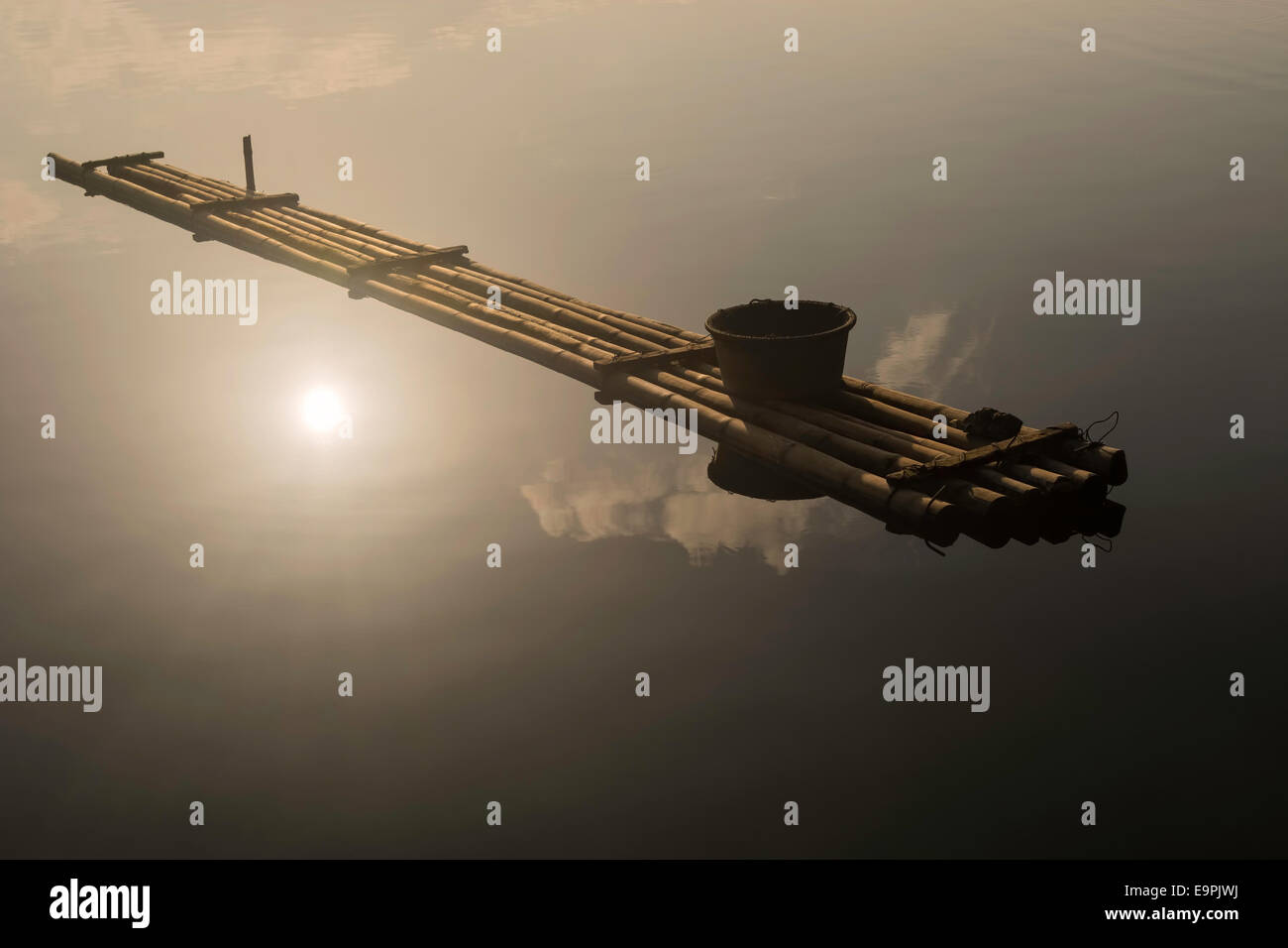 Sunrise over a bamboo fishing raft on a lake, Philippines Stock Photo ...
