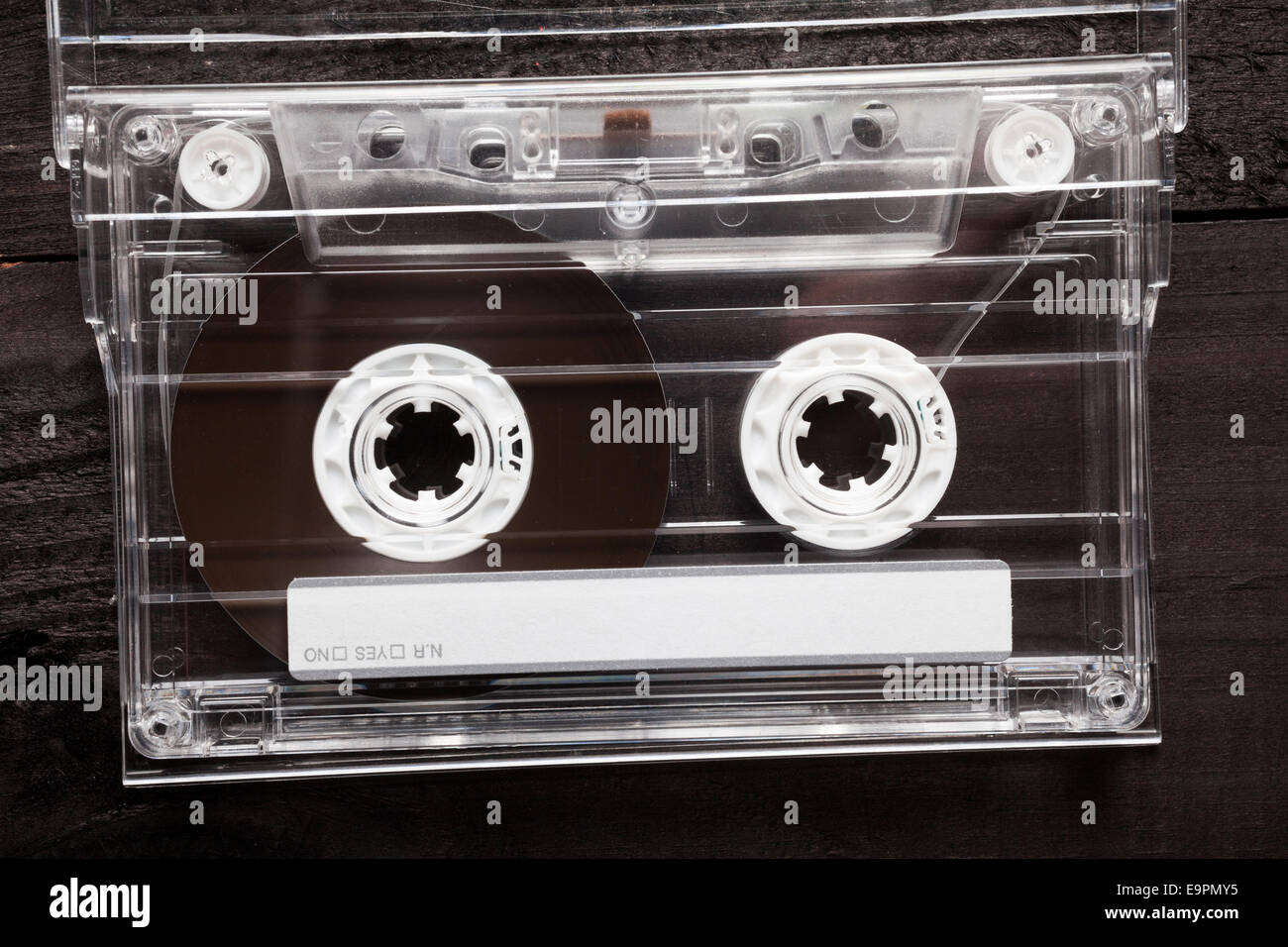 Vintage Compact Cassette on black wooden background Stock Photo - Alamy