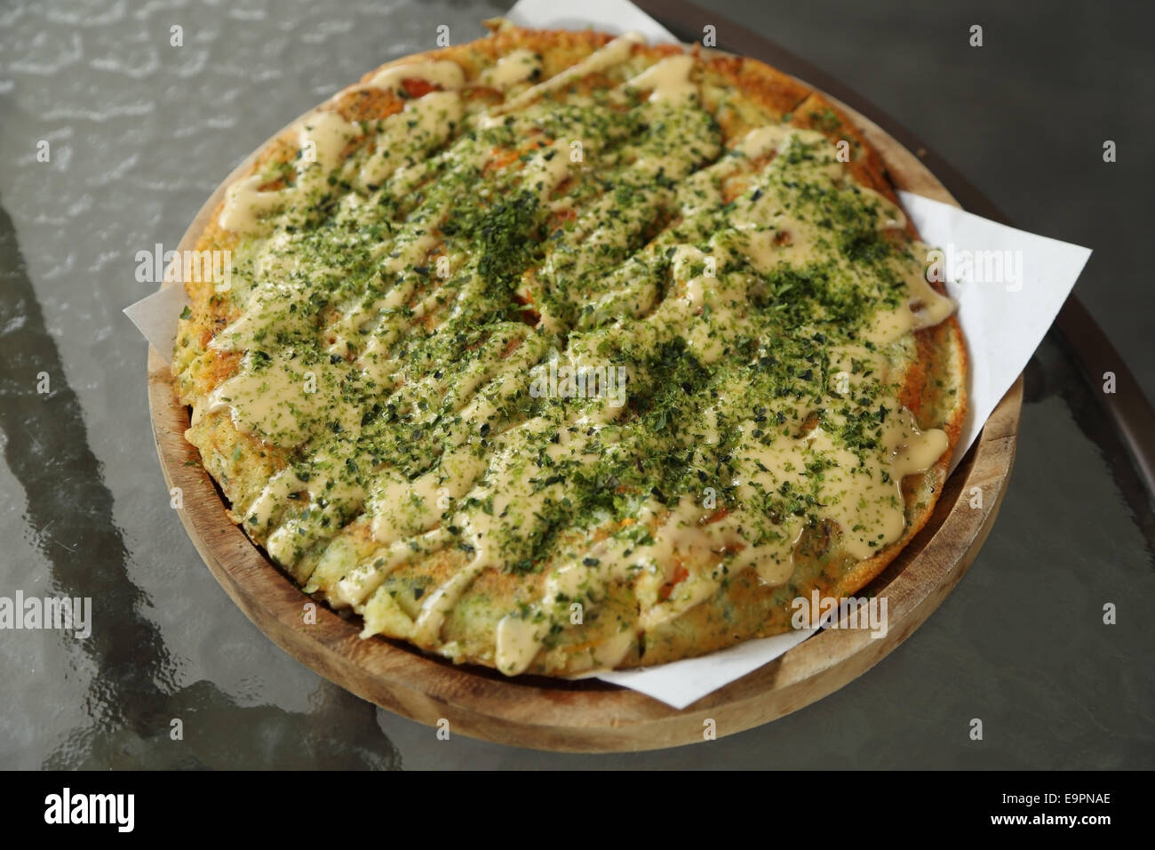 Pizza Japanese style in a cafe Stock Photo - Alamy
