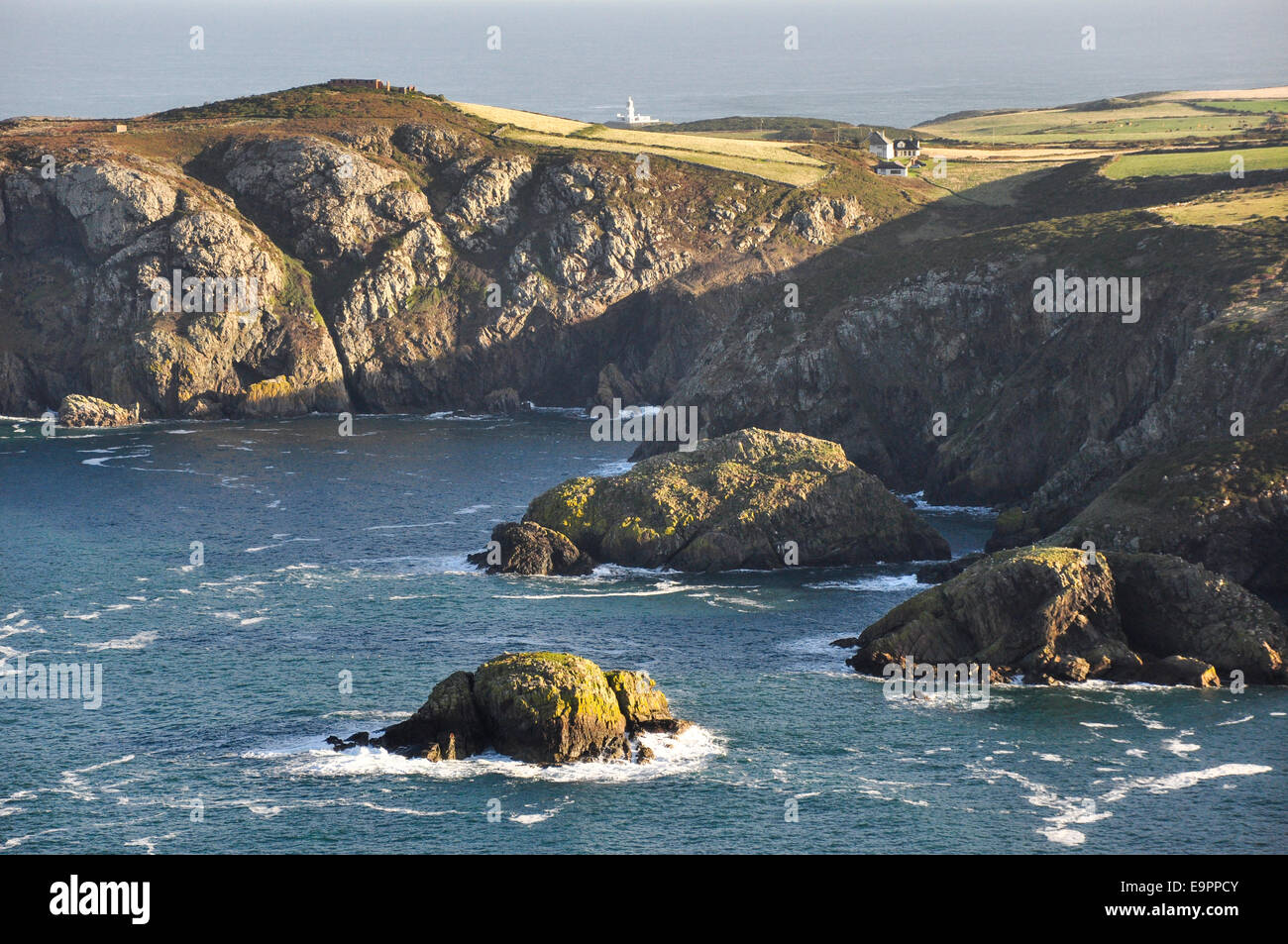 Strumble head lighthouse seen from Pwll Deri in Pembrokeshire Stock ...