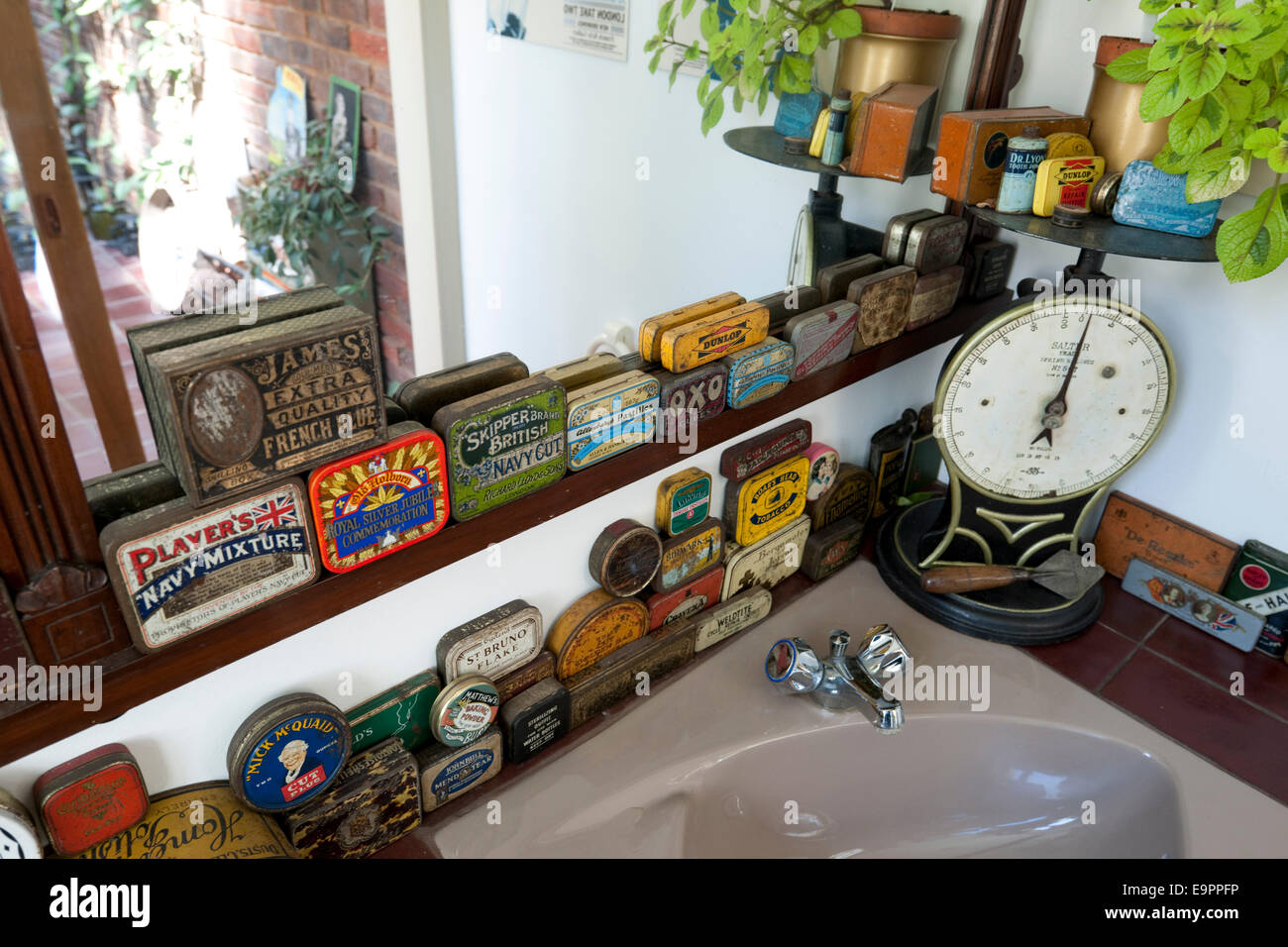 Collection of tin boxes and weight scales in Victorian home, Kingston ...