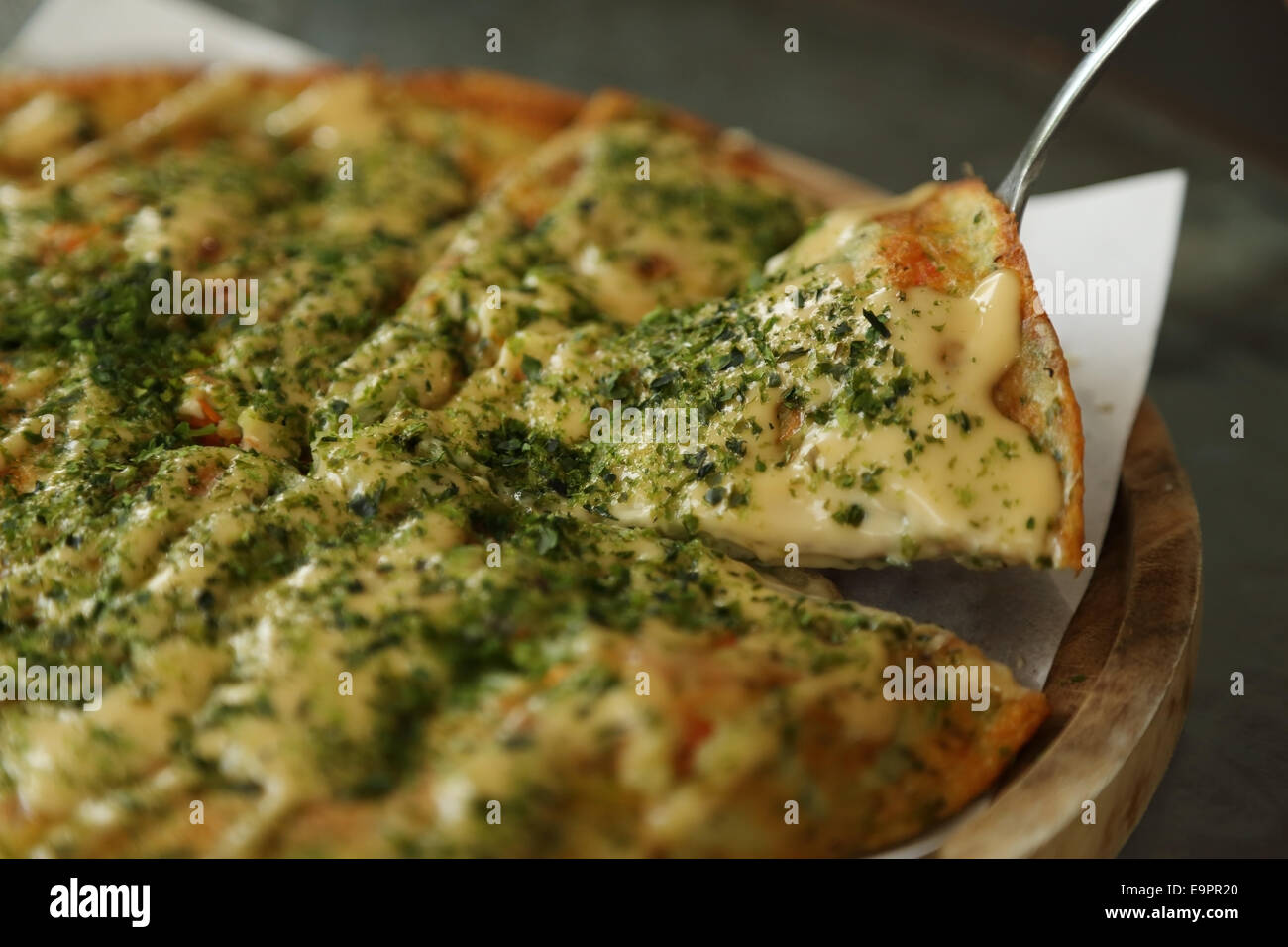 Pizza Japanese style in a cafe Stock Photo - Alamy