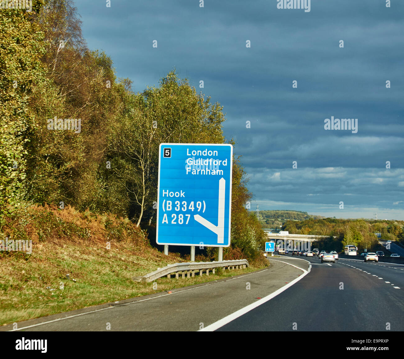 Motorway blue sign turn off hi-res stock photography and images - Alamy