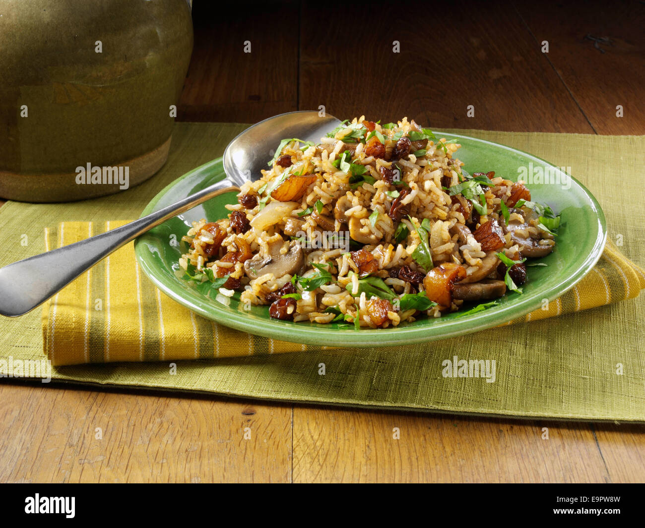 Brown rice and fruit pilaf Stock Photo - Alamy