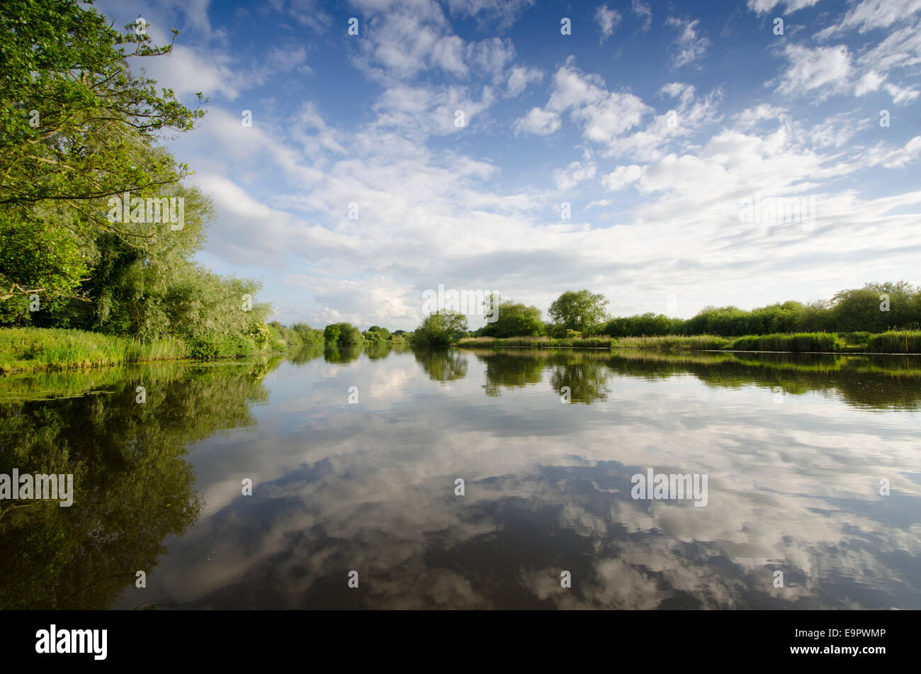 Cloud formations and reflections on the River Yare near Surlingham ...
