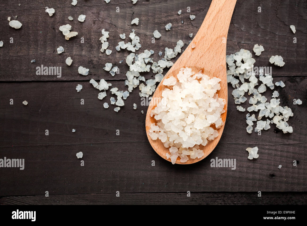 Water kefir grains into a wooden spoon on black wooden background Stock ...