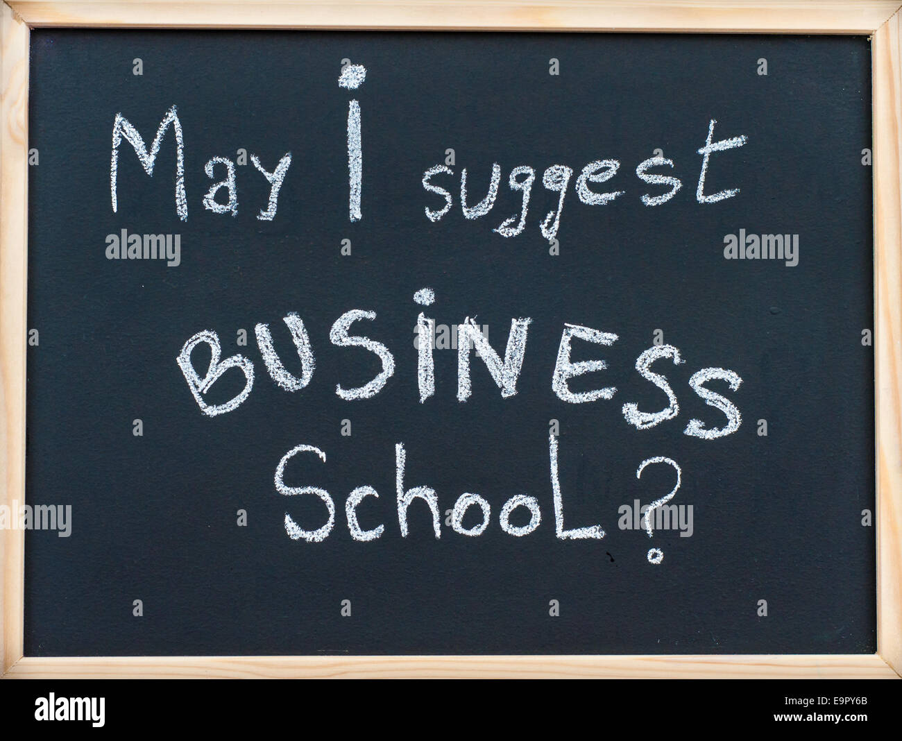 May I suggest Business school message written with white chalk on ...