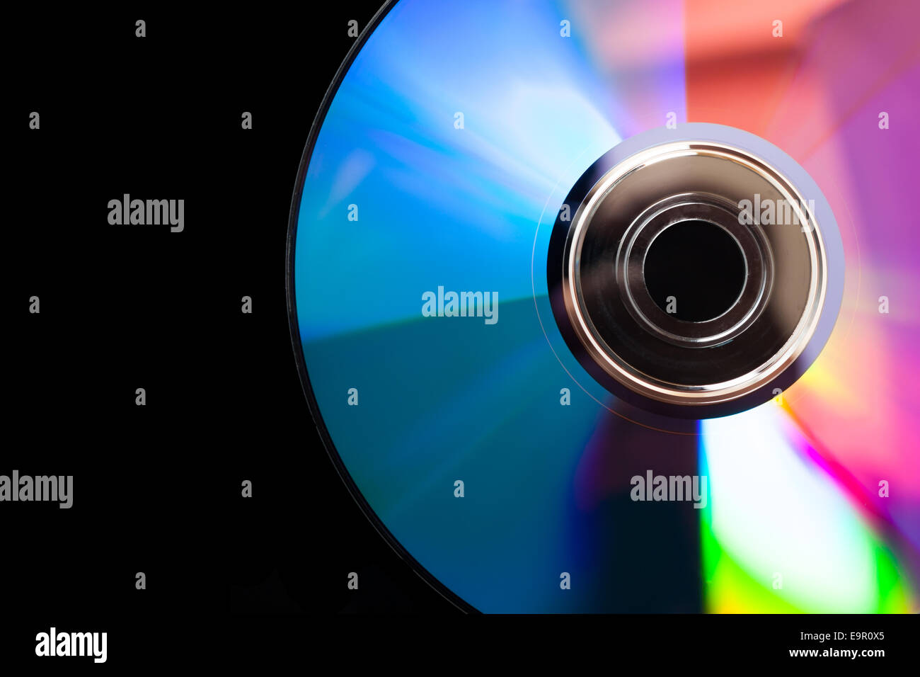Dvd on dark wooden table Stock Photo - Alamy