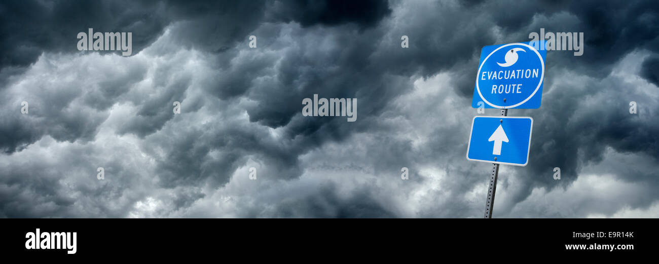 A Directional Sign in Front of Storm Clouds indicating the Storm ...