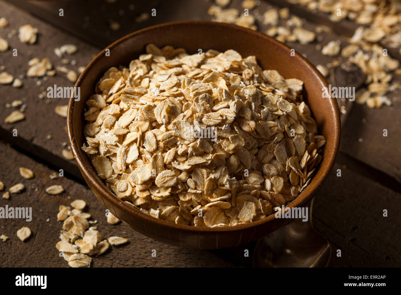 Organic Raw Dry Oats in a Bowl Stock Photo - Alamy