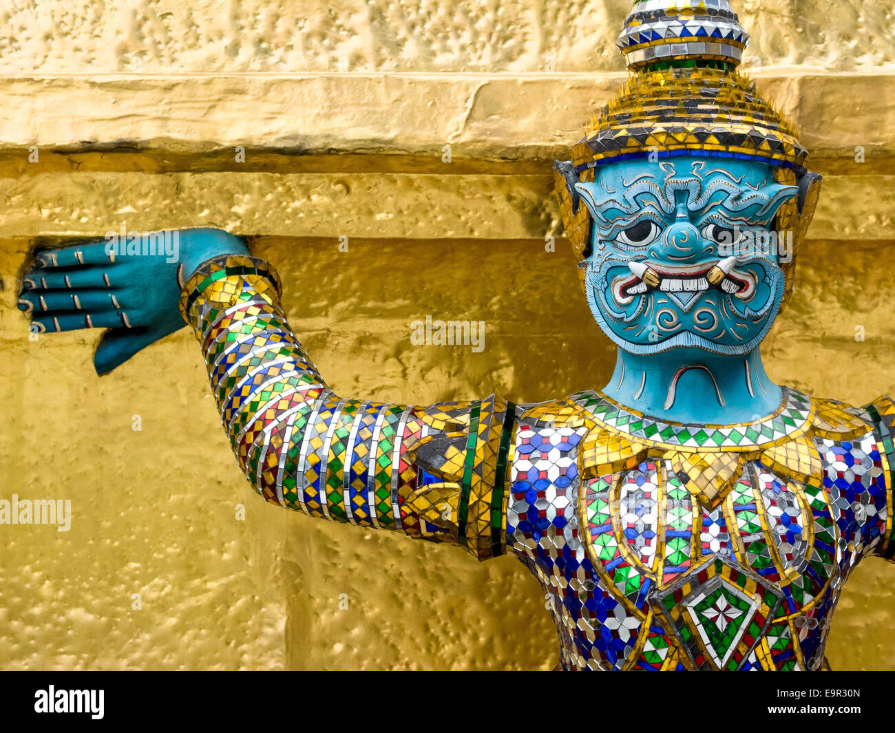 Mythological demon guardian outside Buddhist temple at the Grand Palace ...