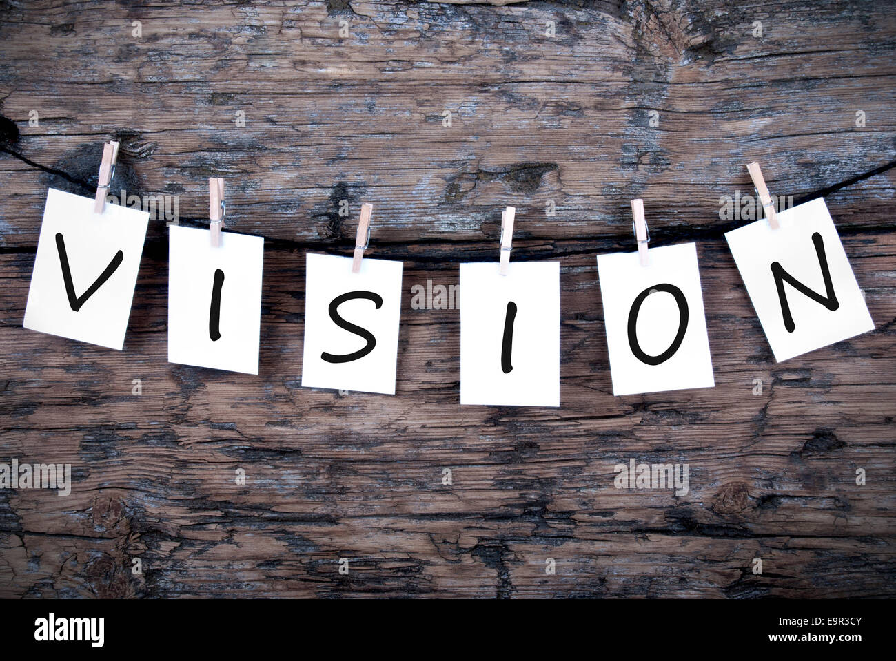 The Word Vision On Whitel Tags On A Line On Wood Stock Photo - Alamy