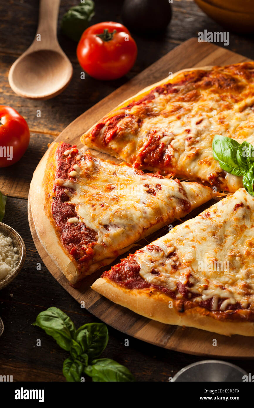 Homemade Hot Cheese Pizza with Basil and Mozzarella Stock Photo - Alamy