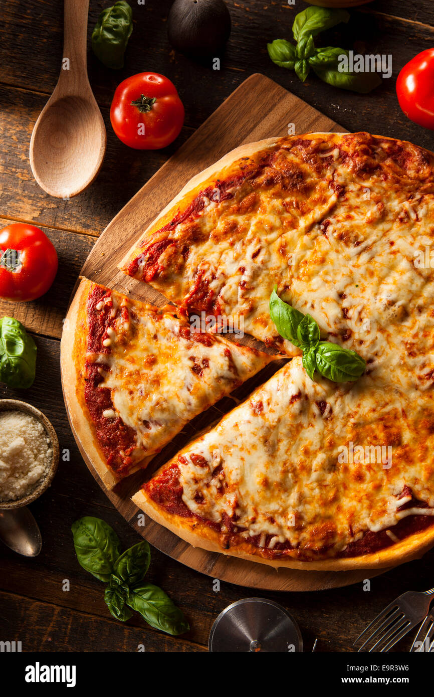 Homemade Hot Cheese Pizza with Basil and Mozzarella Stock Photo - Alamy