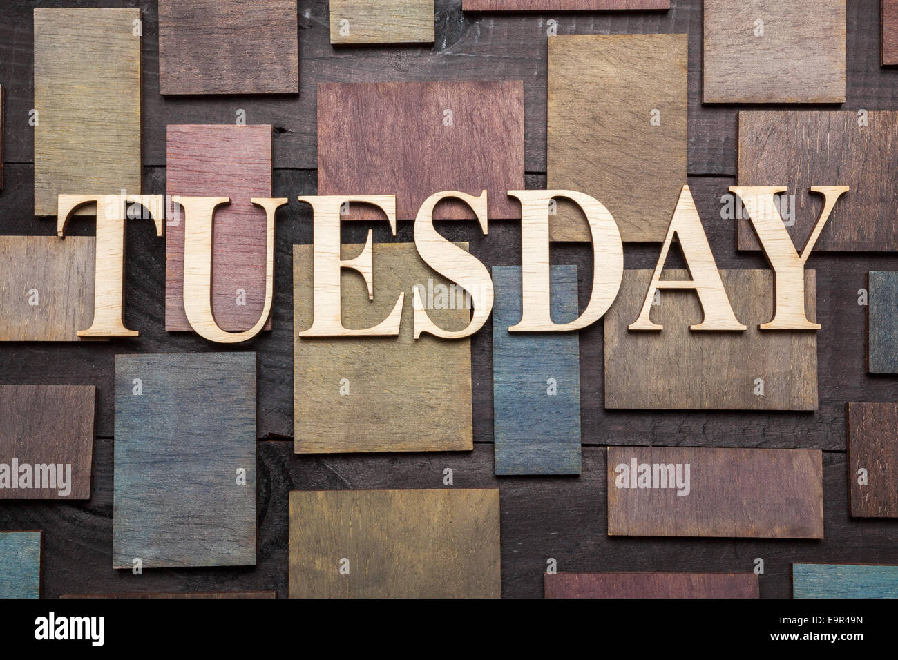 Wooden letters forming words TUESDAY written on wooden background Stock ...