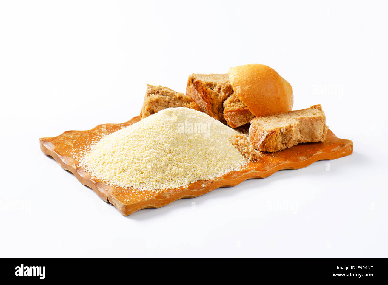Pieces of stale bread and pile of finely ground bread crumbs Stock ...