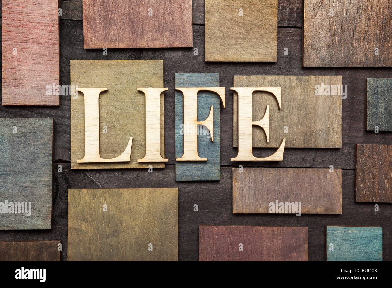 Wooden letters forming word LIFE written on wooden background Stock ...