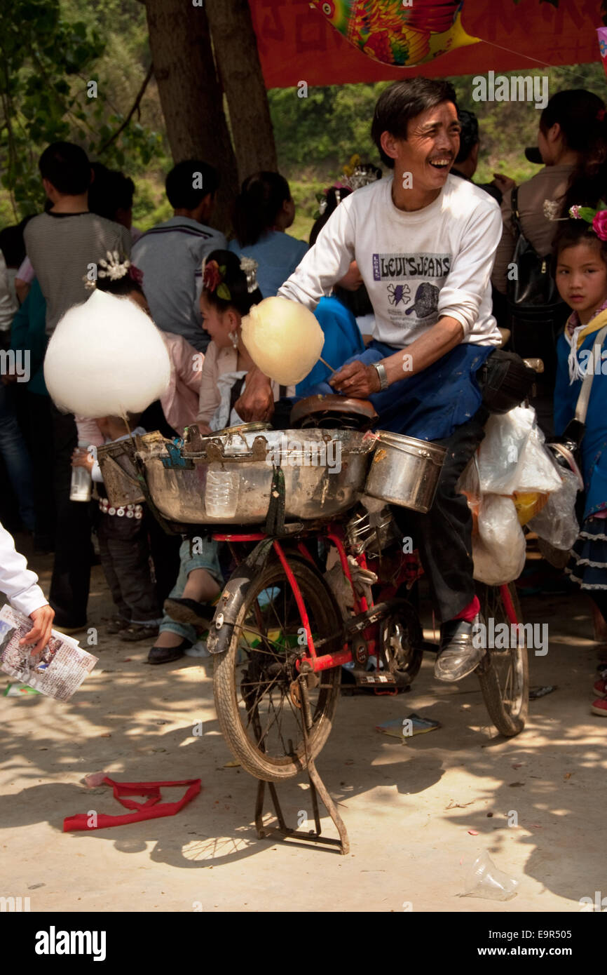Cotton candy man at Sister Meal Festival, Shidong, Guizhou Province ...