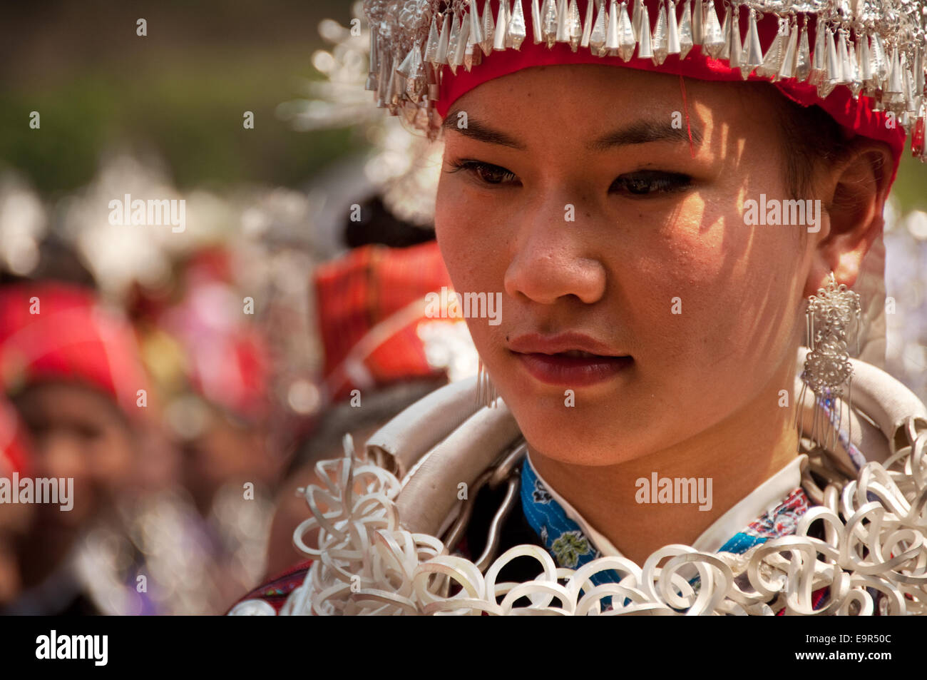 Miao girl with silver headdress and necklaces, Sister Meal Festival ...