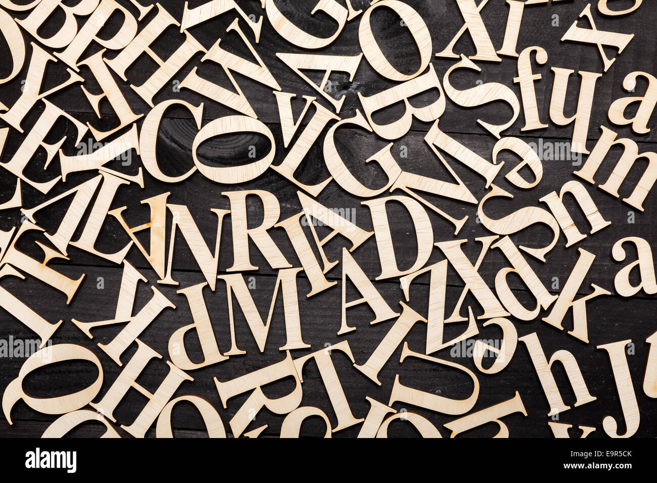 Wooden letters on dark wooden background Stock Photo - Alamy