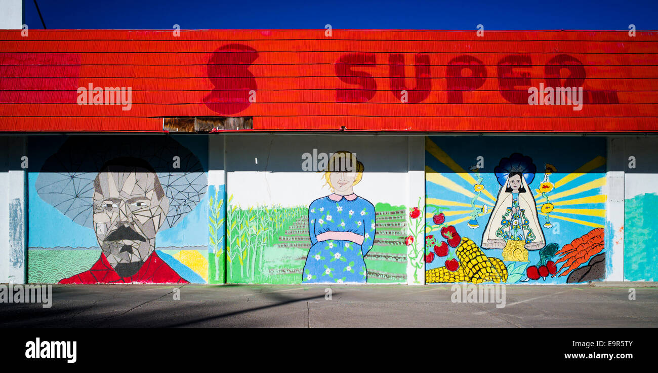 Colorful murals on exterior wall of old grocery store Stock Photo - Alamy