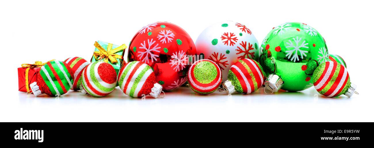 Long Christmas border with red, white and green baubles over white ...