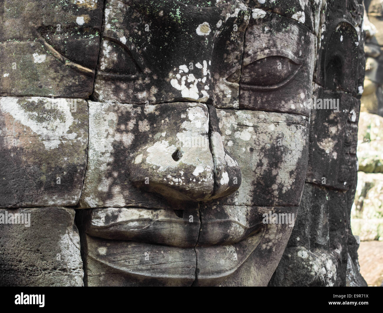 Giant stone face at ancient Bayon Temple at Angkor, Siem Reap, Cambodia ...