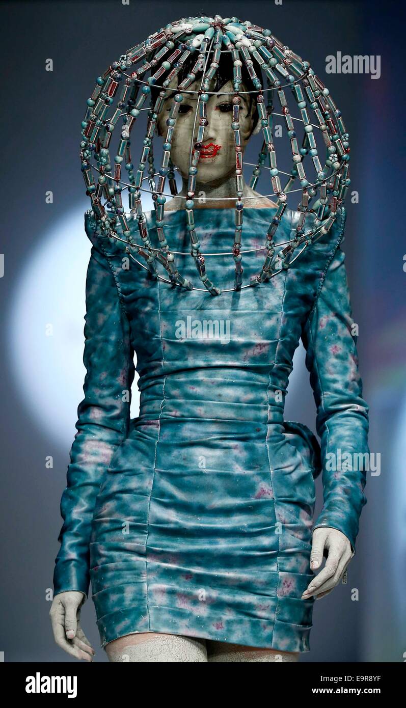 Beijing, China. 31st Oct, 2014. A model presents a creation designed by ...