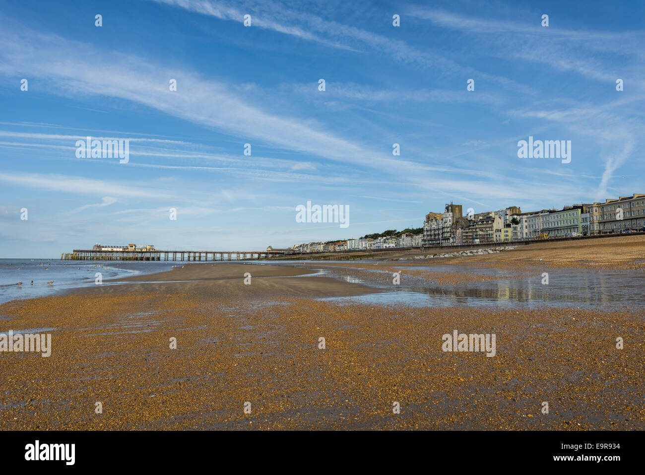 The beach, seafront and pier at Hastings, a seaside town and popular ...