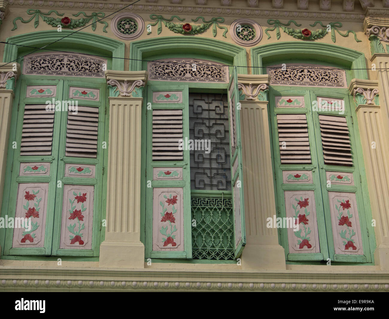 Windows of shop-houses and architecture in Little India, Singapore ...