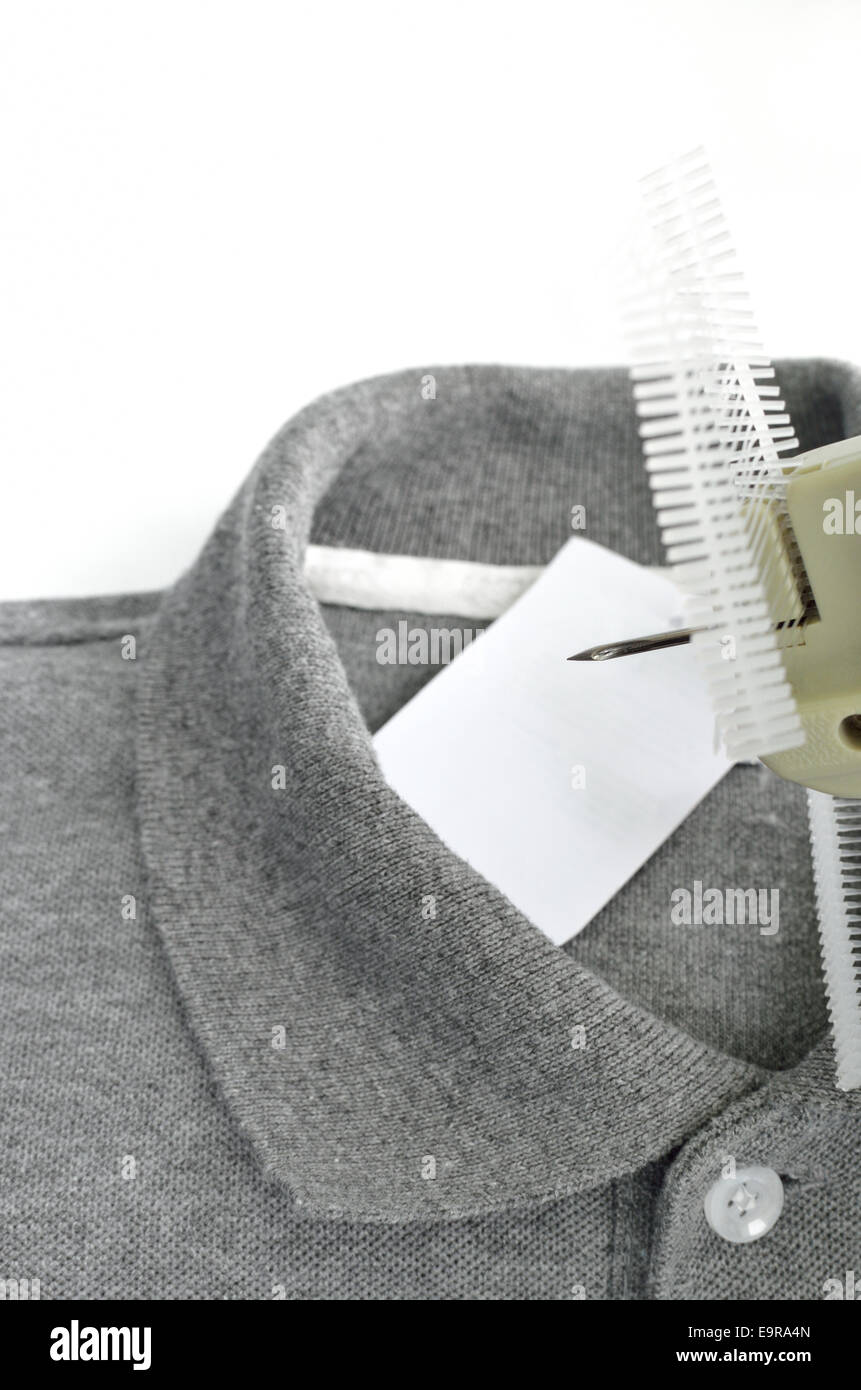 Tagging gun of cloth Stock Photo - Alamy