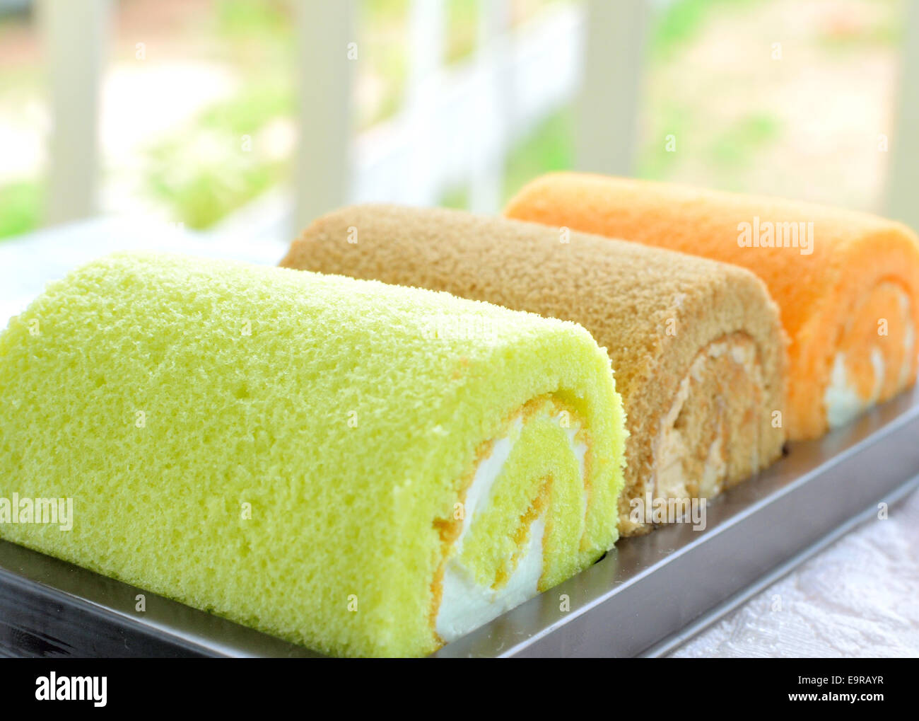 Roll cake with cream Stock Photo - Alamy