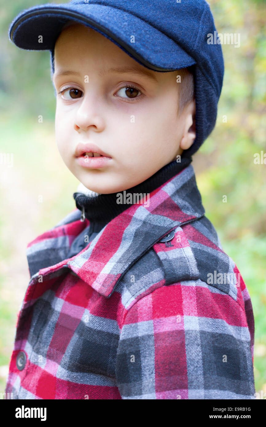 child boy fashion portrait check coat wool cap Stock Photo - Alamy
