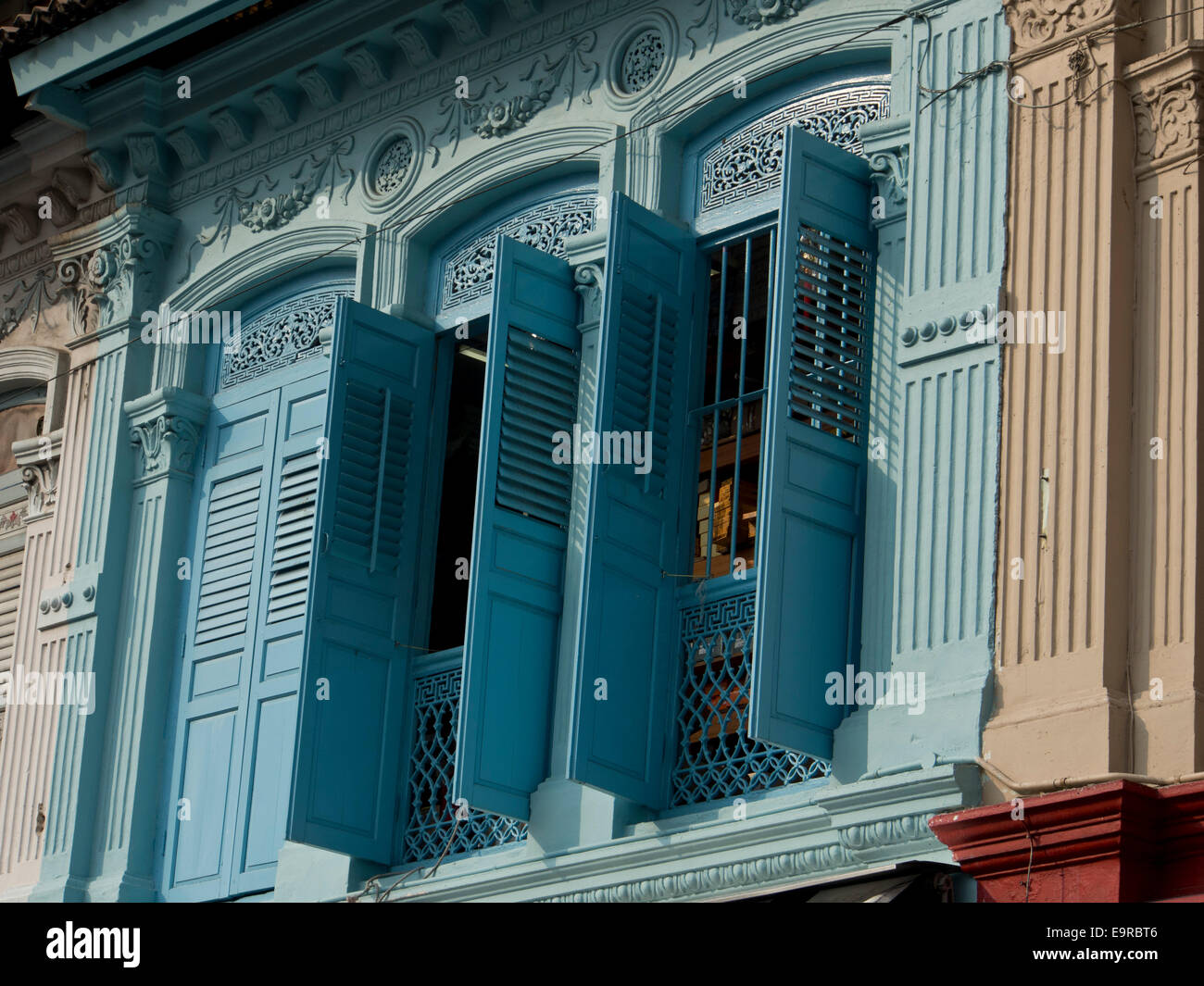 Windows of shop-houses and architecture in Little India, Singapore ...