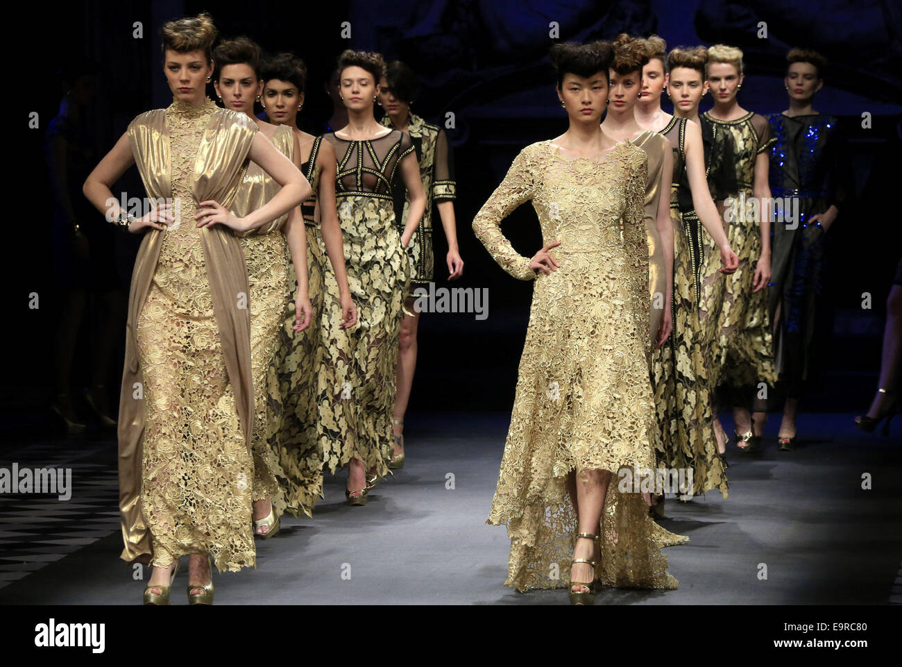 Beijing, China. 1st Nov, 2014. Models present creations designed by Xie ...