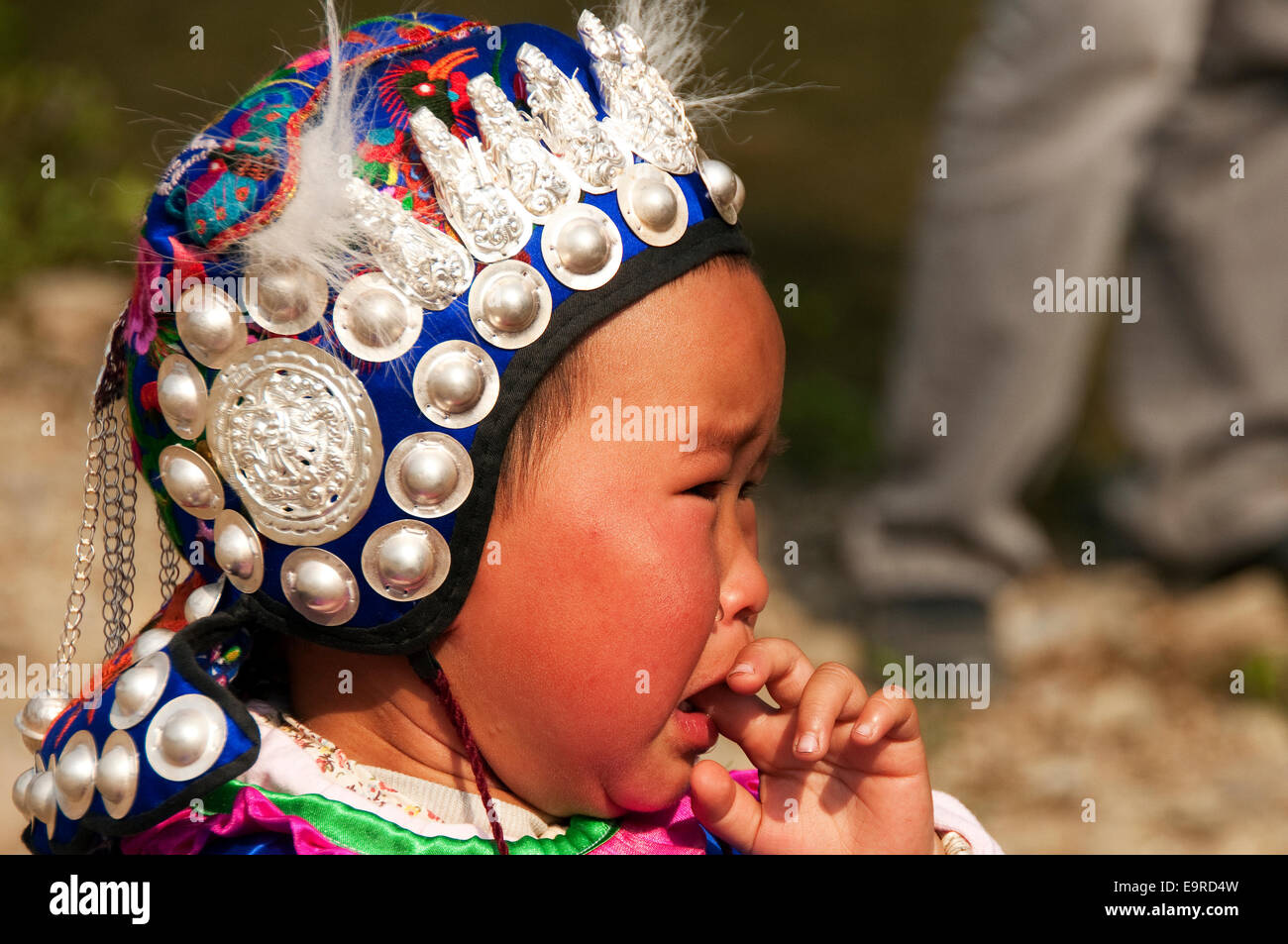 Miao child crying, Shidong, Guizhou Province, China Stock Photo - Alamy
