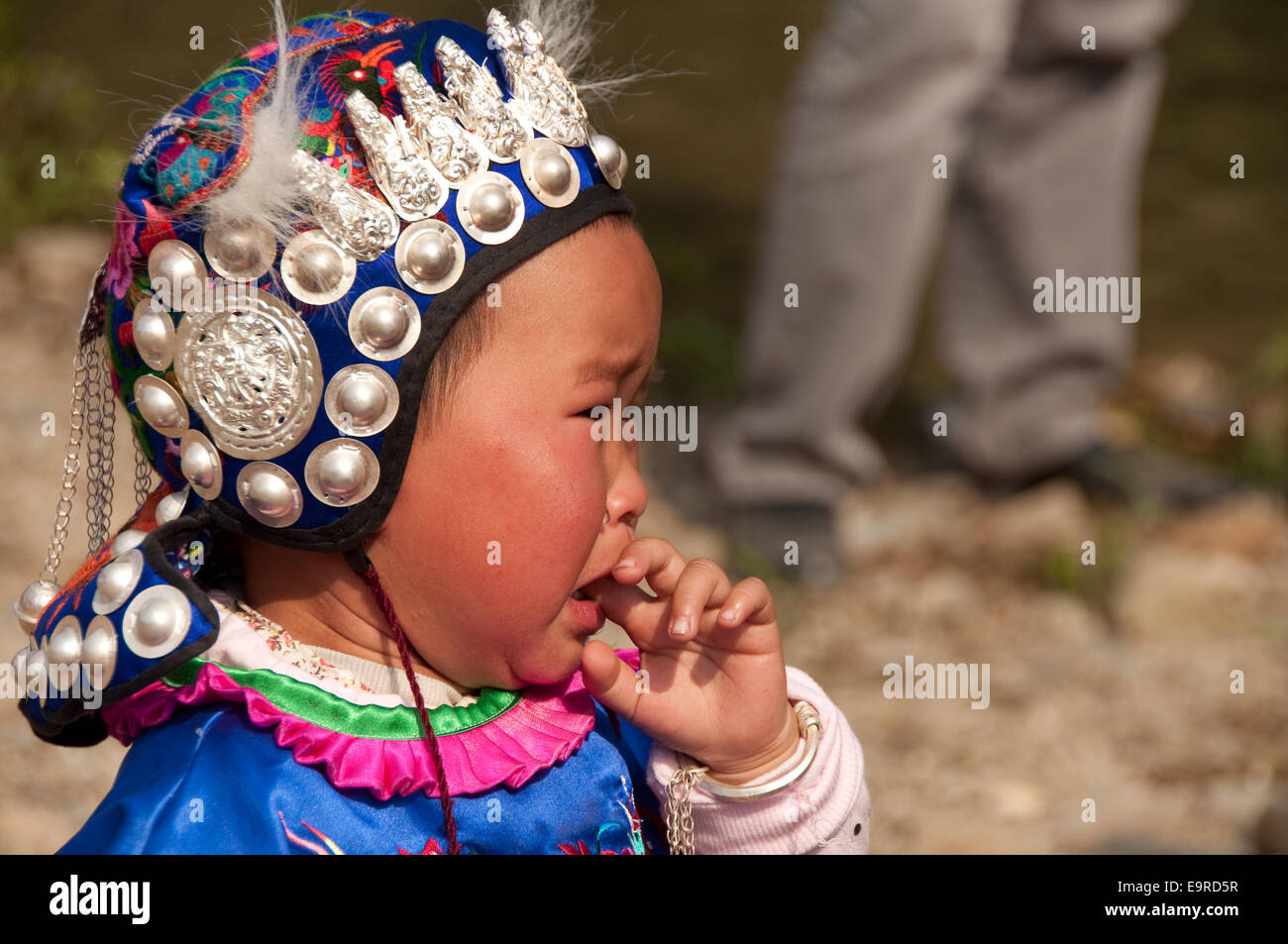 Miao child crying, Shidong, Guizhou Province, China Stock Photo - Alamy
