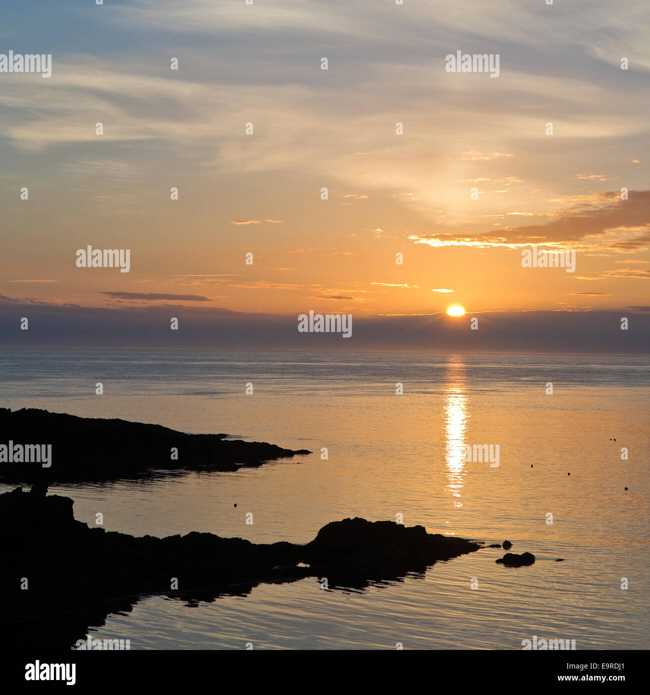 Sunrise at Bull Bay (Port Llechog) looking north out to sea on northern ...