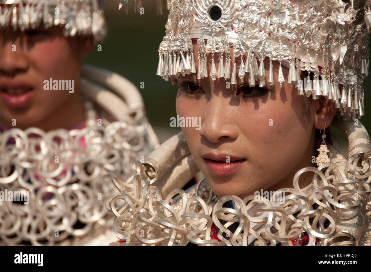 Miao girls with silver headdress and massive necklaces, Sister Meal ...