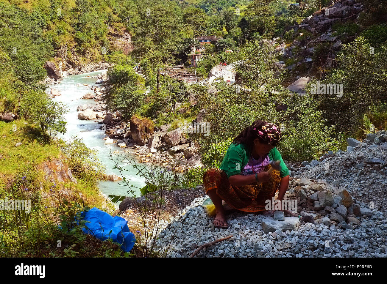 Man breaking rocks hi-res stock photography and images - Alamy