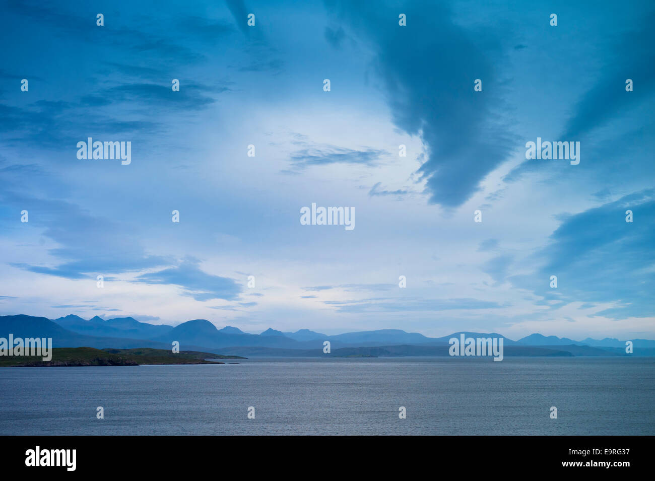 Breathtaking Scottish landscape with sea loch and mountains under ...