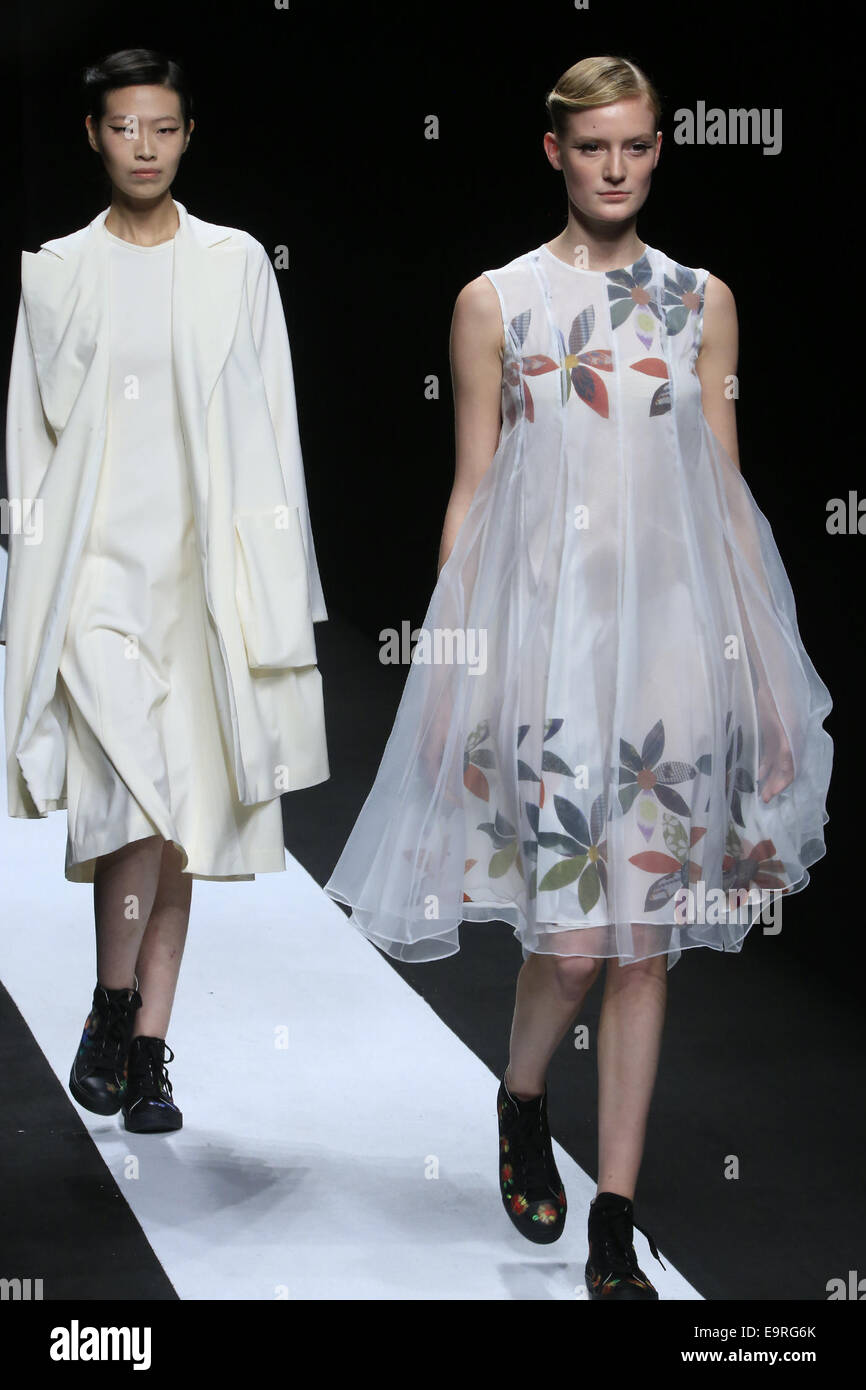 Beijing, China. 1st Nov, 2014. Models present creations by designer ...