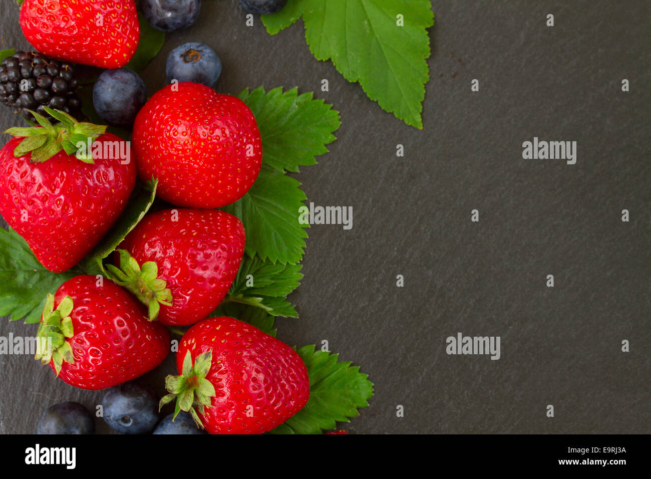 border of fresh berries Stock Photo - Alamy