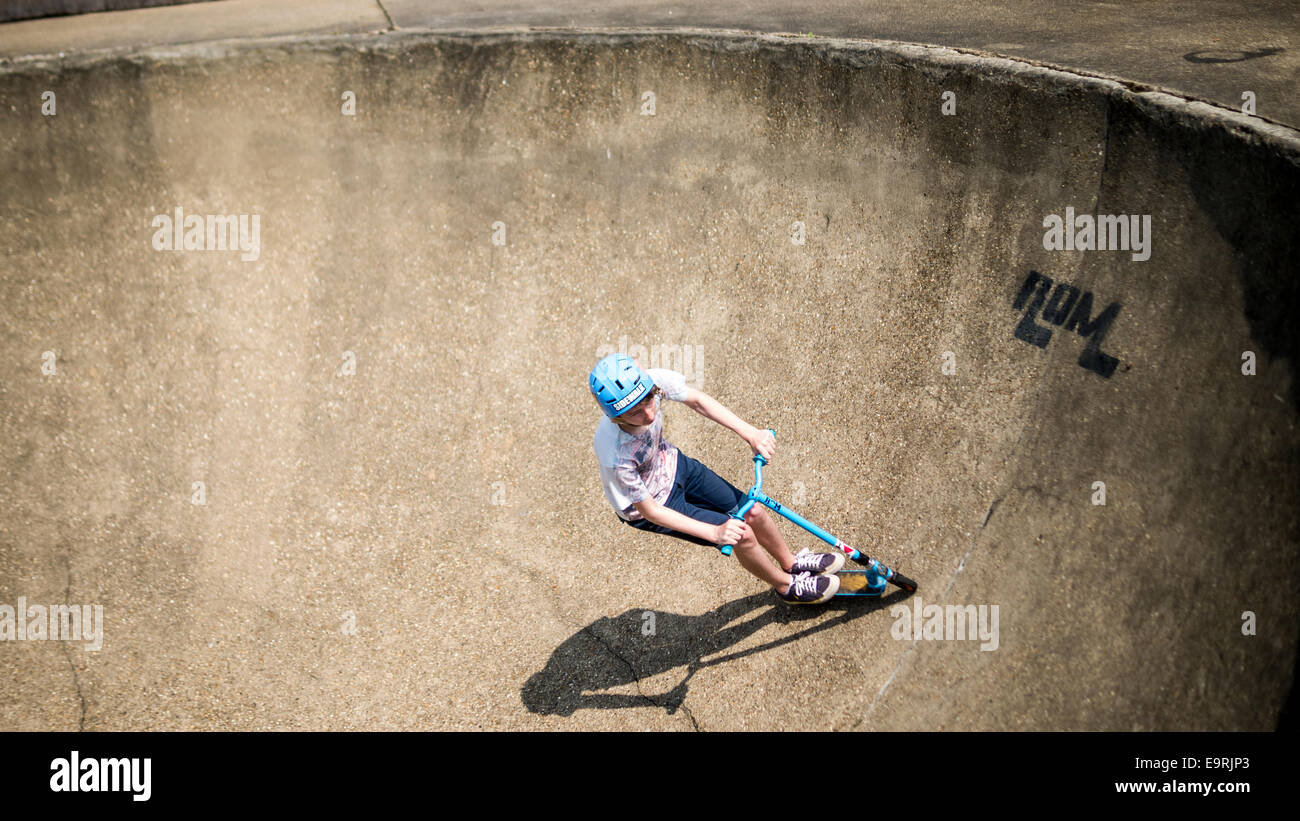 Teenager on a Scooter, The Rom Skate Park, Hornchurch, Essex, Britain ...