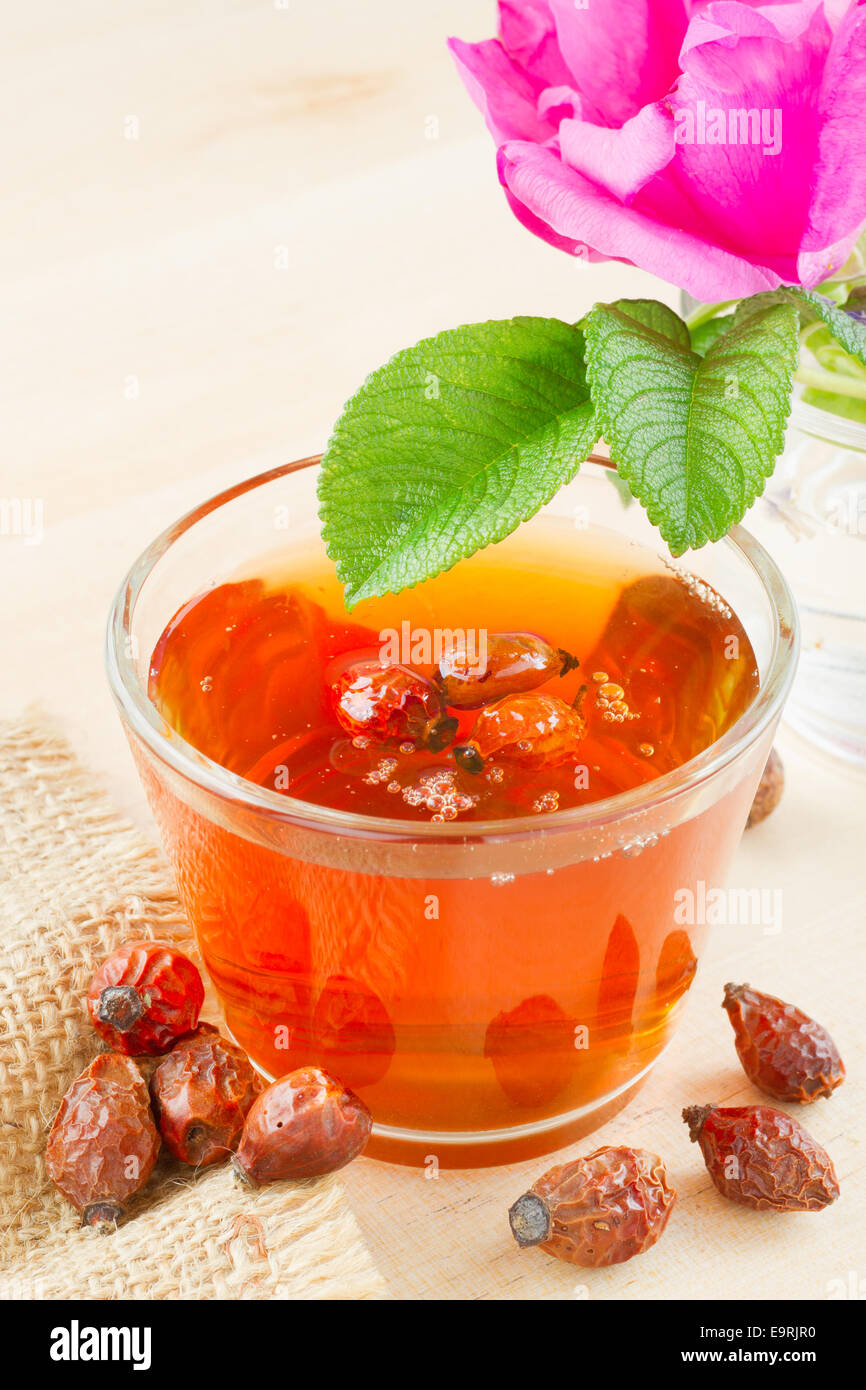 rose hips tea and rose-hip flowers Stock Photo - Alamy