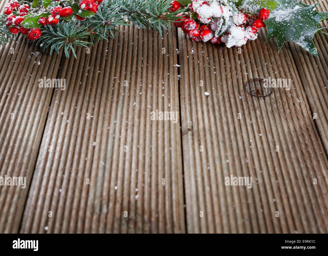 Red holly berries with wood texture hi-res stock photography and images ...