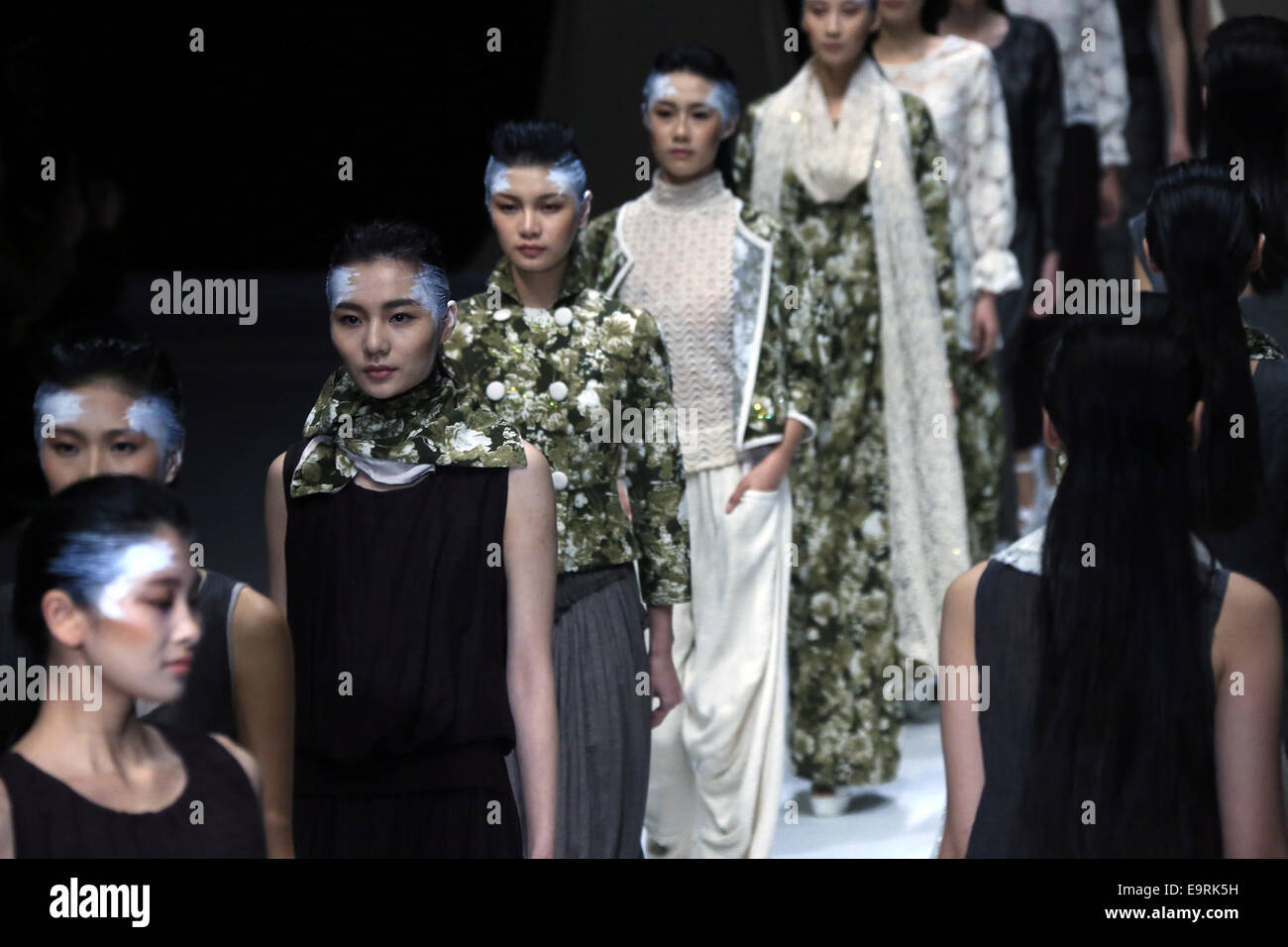 Beijing, China. 1st Nov, 2014. Models present creations during the ...
