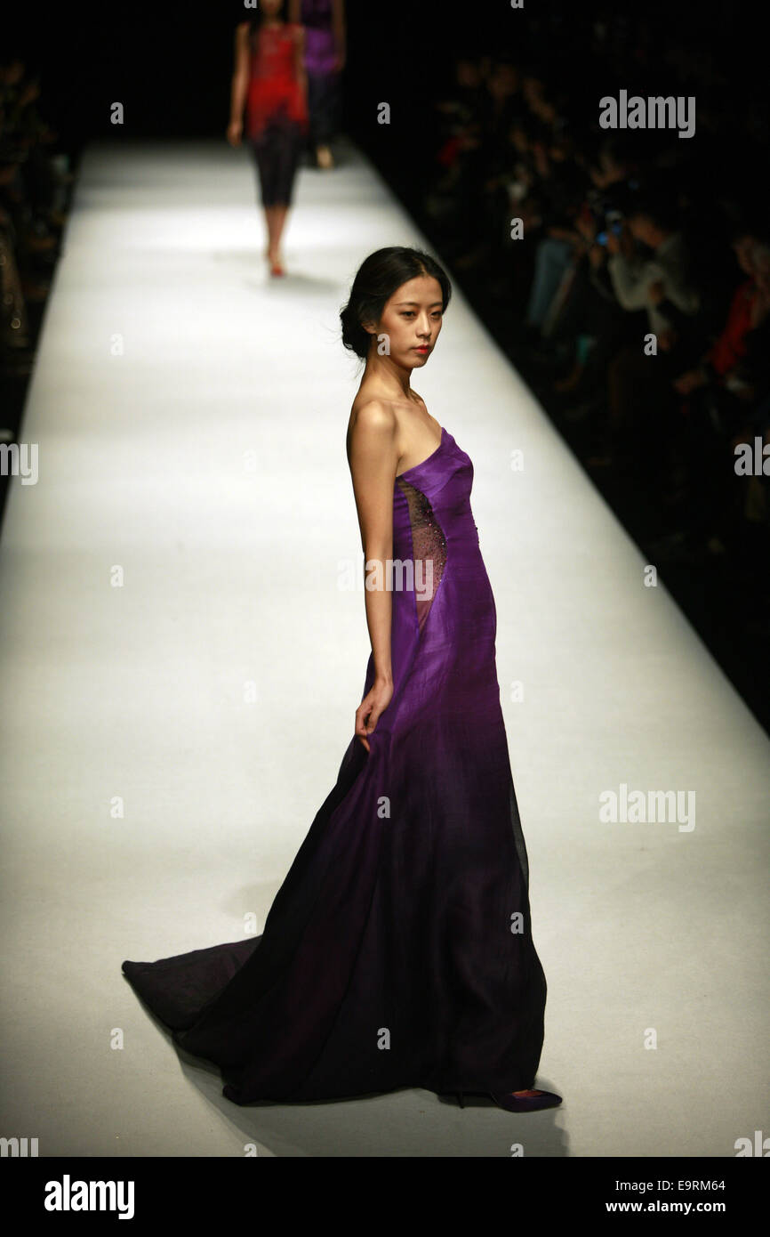 Beijing, China. 1st Nov, 2014. A model presents a creation at the ...