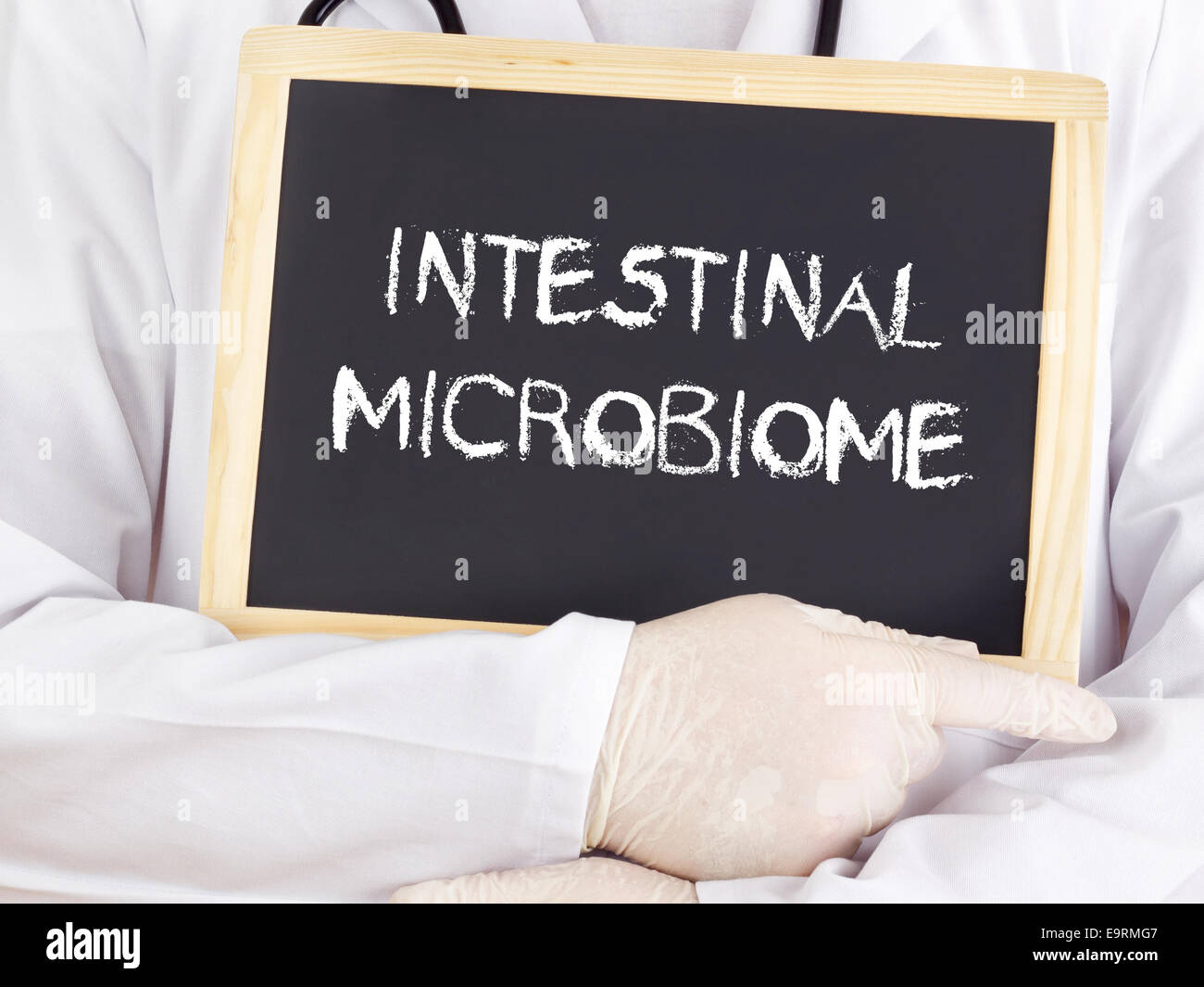 Doctor shows information: intestinal microbiome Stock Photo - Alamy