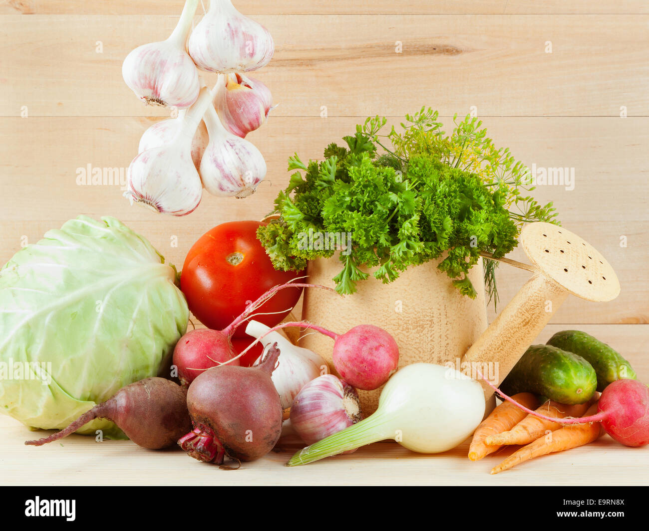 Different summers vegetables on table Stock Photo - Alamy